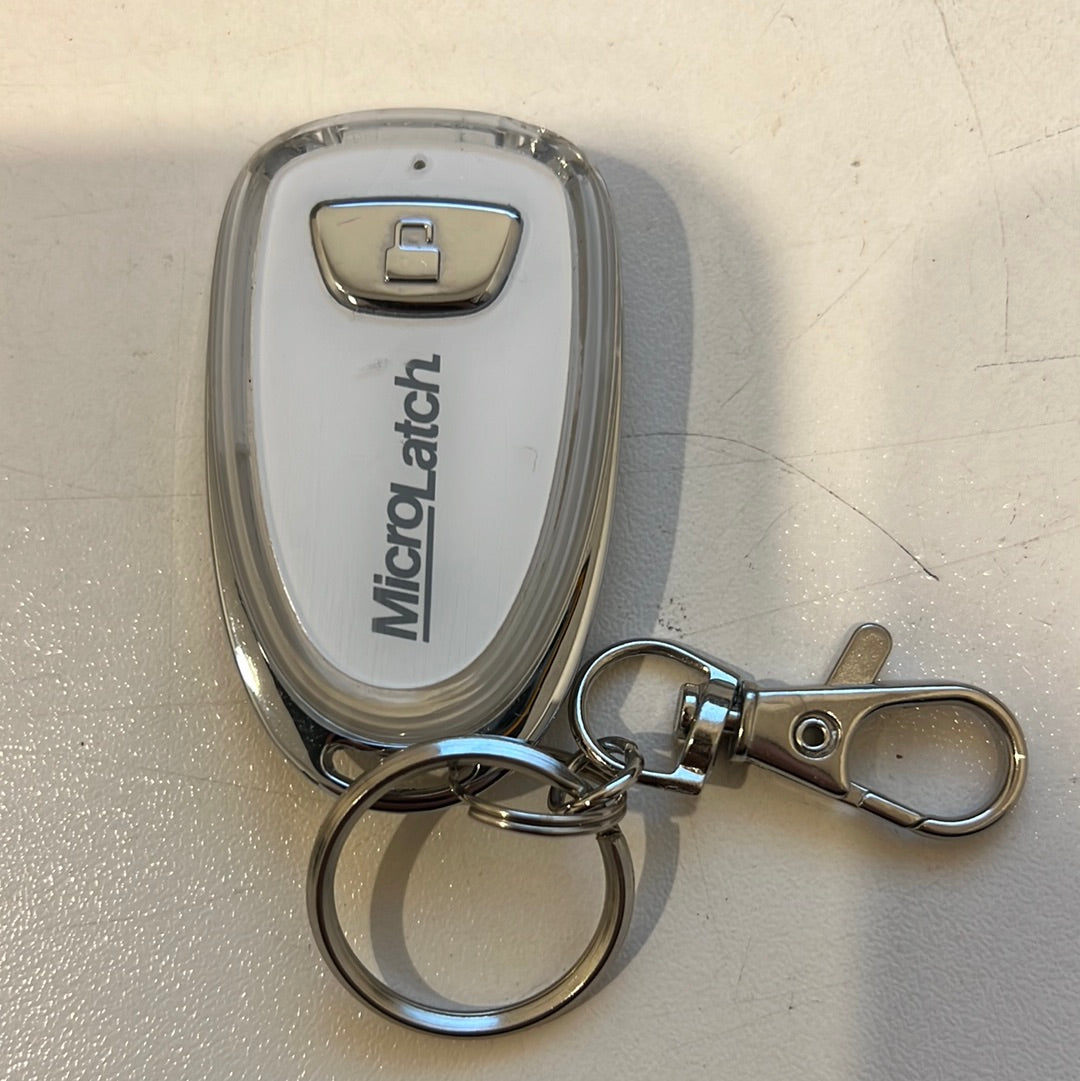 microlatch remote white one button – LOCKMATIC